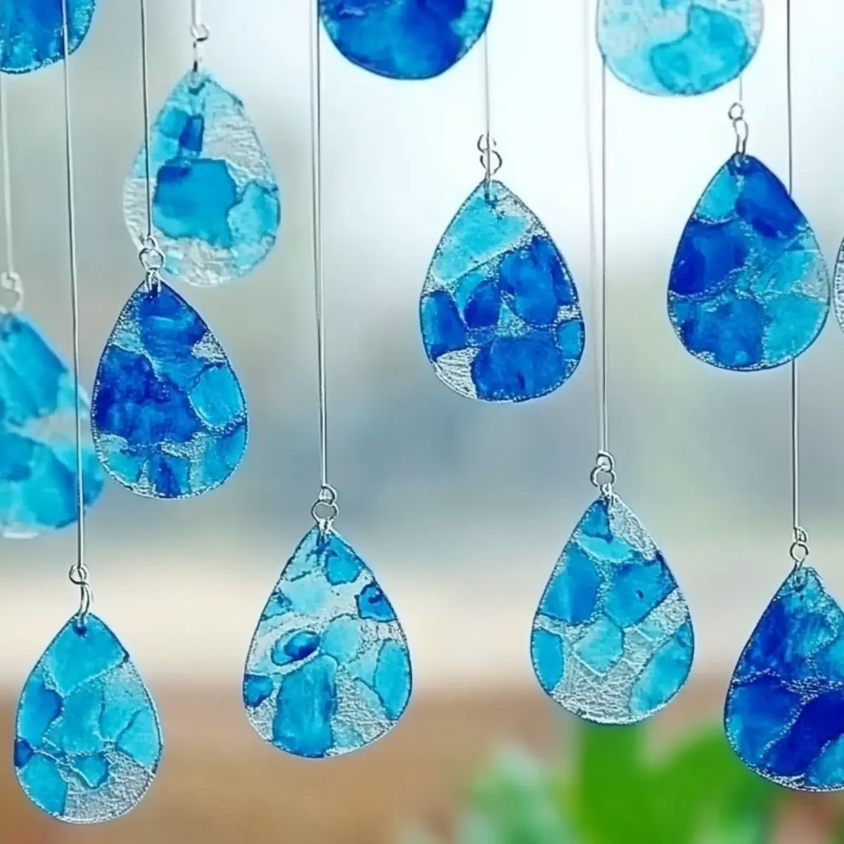 Blue Crayon Raindrop Suncatchers: Easy Craft for Sunny Spaces - DailyRecipe